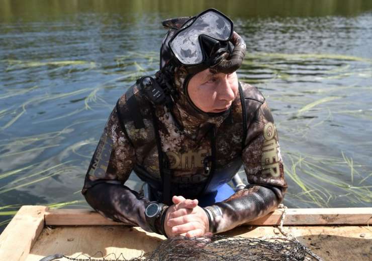 In pics: President Vladimir Putin goes fishing in Russia's Siberia ...