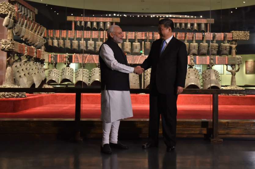 In pics: With warm handshake, Modi-Jinping historic bonhomie grabs ...