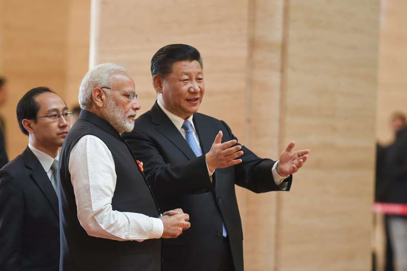 In pics: With warm handshake, Modi-Jinping historic bonhomie grabs ...