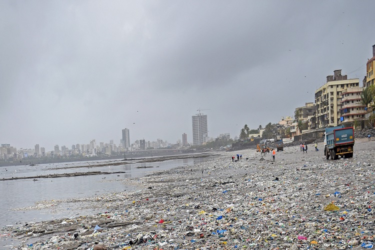 Mumbai rains: High tide spills nearly 361 tonnes of garbage along Marine Drive| See pictures