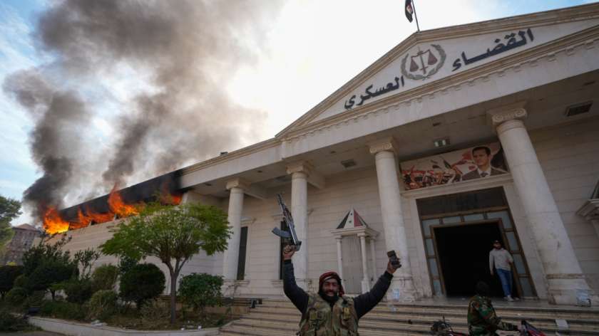 Syrian rebels topple statues as Assad regime collapses | IN PICS