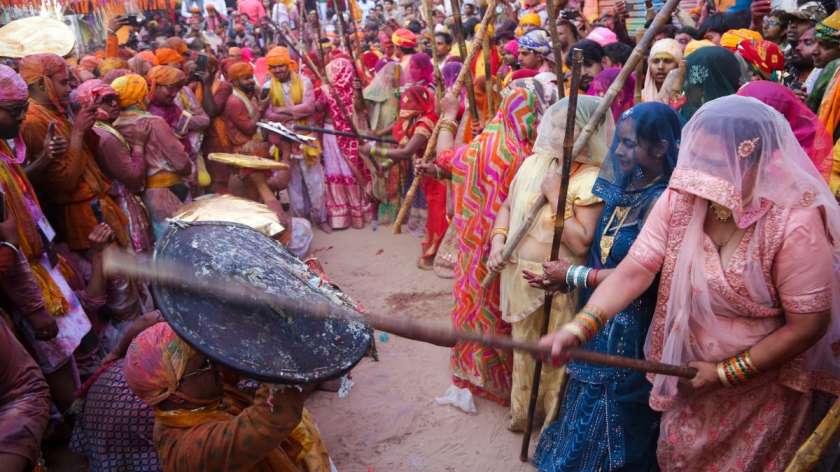 Holi 2025: Women in Mathura kick off Lathmar Holi celebrations with ...