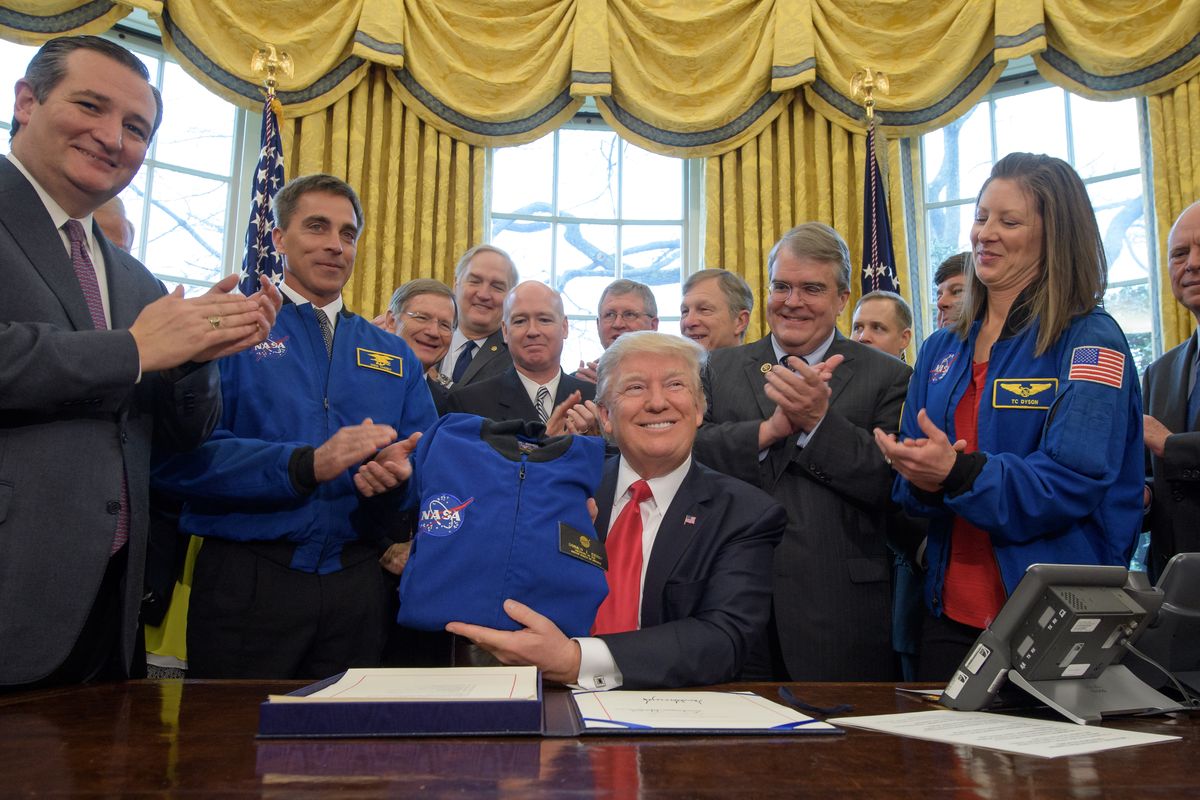 Trump signs NASA funding bill, sets goal of human on Mars | World News ...