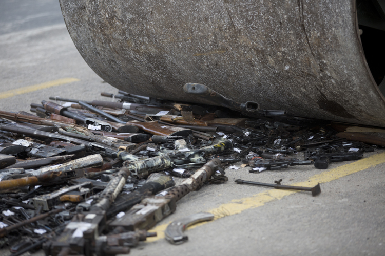 Steamrolled and melted: Brazil destroys over 4,000 guns seized from ...