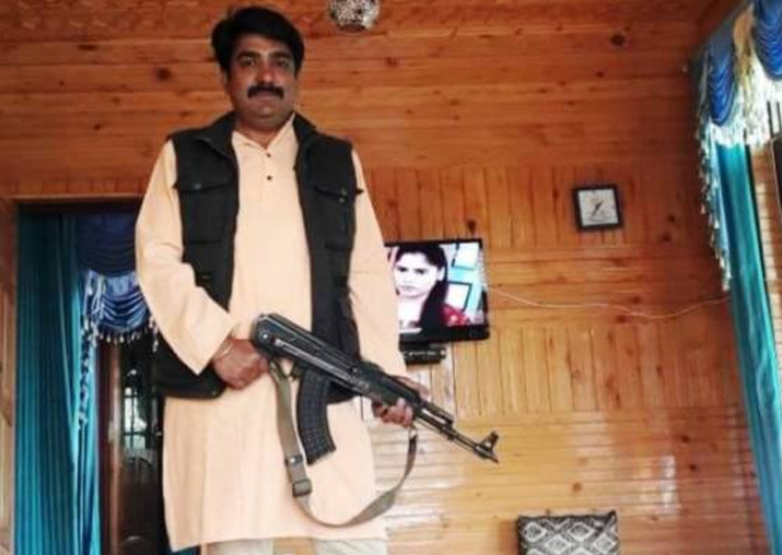BJP embarrassed as photograph of its 'J&K leader' brandishing AK-47 ...