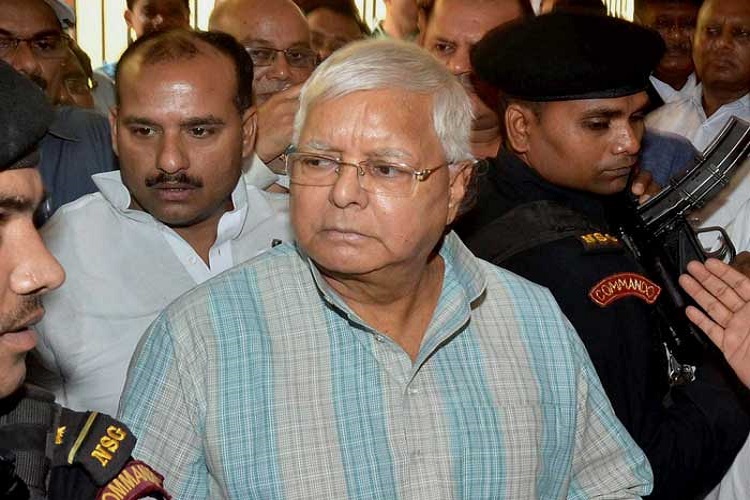 IRCTC scam case: Lalu Prasad, wife, son Tejashwi Yadav summoned by ...