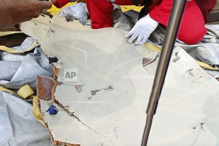 Indonesia plane crash search finds remains, debris at sea | World News ...