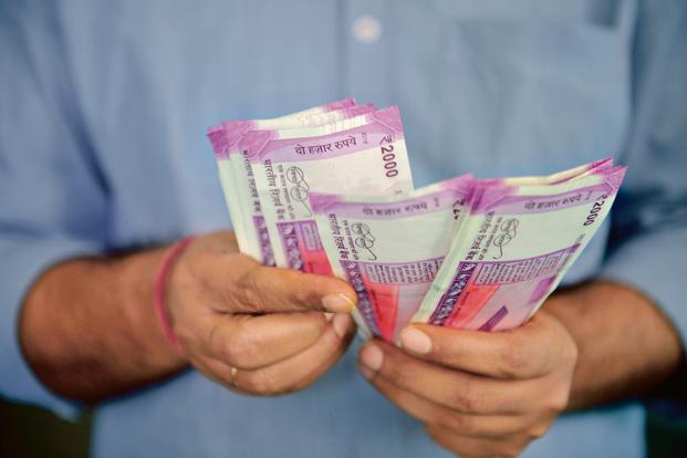 Rupee rises 15 paise to 69.45 vs US dollar in early trade | Business ...