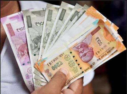 Rupee slips 16 paise to 68.58 against US dollar | Business News – India TV