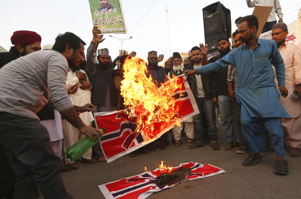 Norwegian flags burnt in Pakistan in reaction to burning of Holy Quran ...