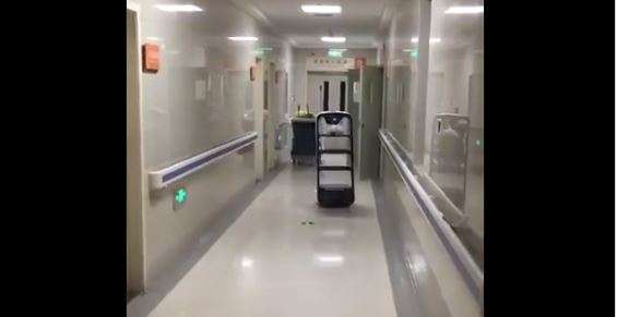 Watch: Video captures robot serving and attending to coronavirus ...