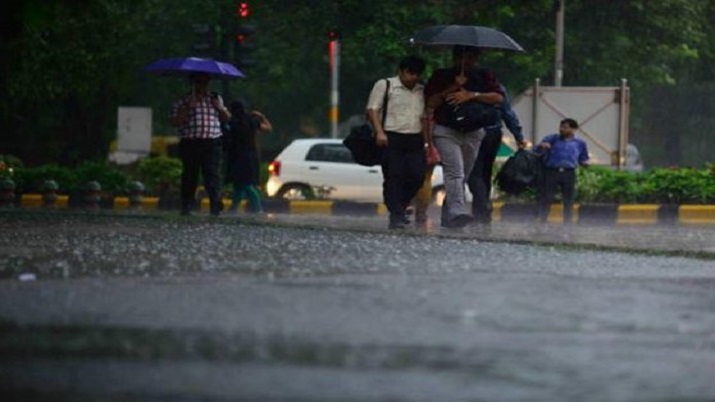 Overnight rain, gusty winds bring mercury down in Delhi | India News – India TV