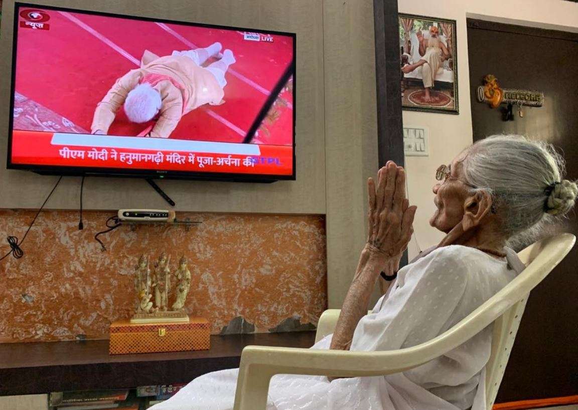 In pics: Hiraben looks overjoyed as she watches PM Modi at Ram Mandir ...