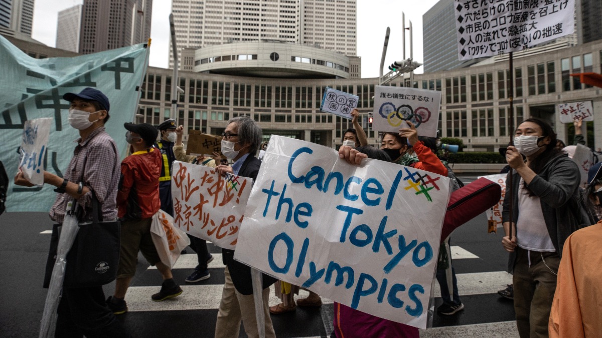 'Go Home!': Anti-Olympic protesters demonstrate against the IOC in ...
