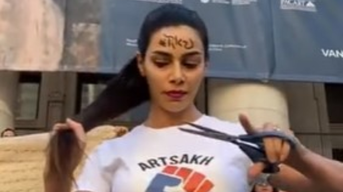 Viral Video: Woman in Canada chops off hair in solidarity after Mahsa ...