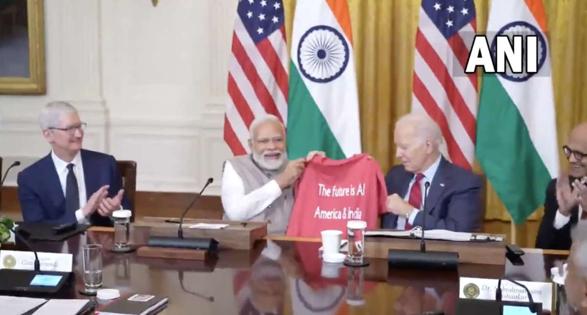US President Biden gifts special t shirt to PM Modi with his AI America ...