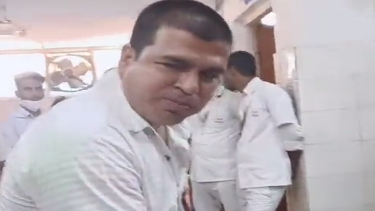 Caught on camera: MP revenue official swallows bribe money after ...