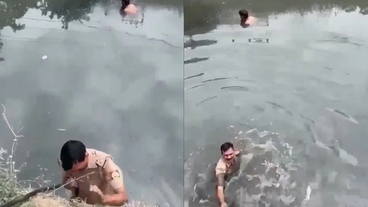 UP: Sub-inspector jumps into dirty drain to save drunkard in Noida, garners praise | WATCH ...