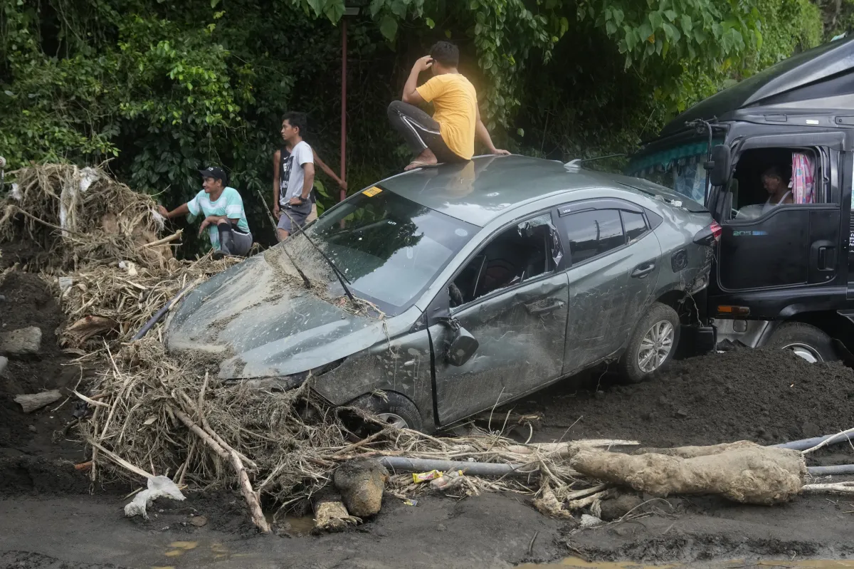 Philippines storm: 126 killed as two months' worth of rain falls in ...