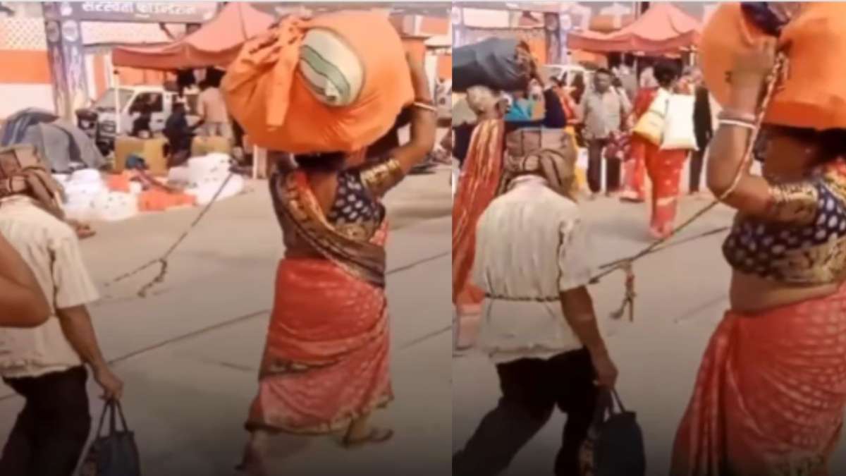 Viral Video: Couple ties rope to stay together during holy dip at Maha ...