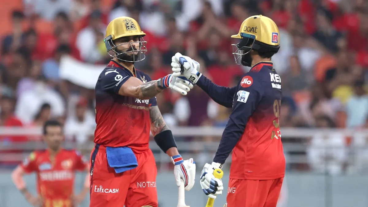 Virat Kohli's record-breaking half-century leads RCB to maintain ...