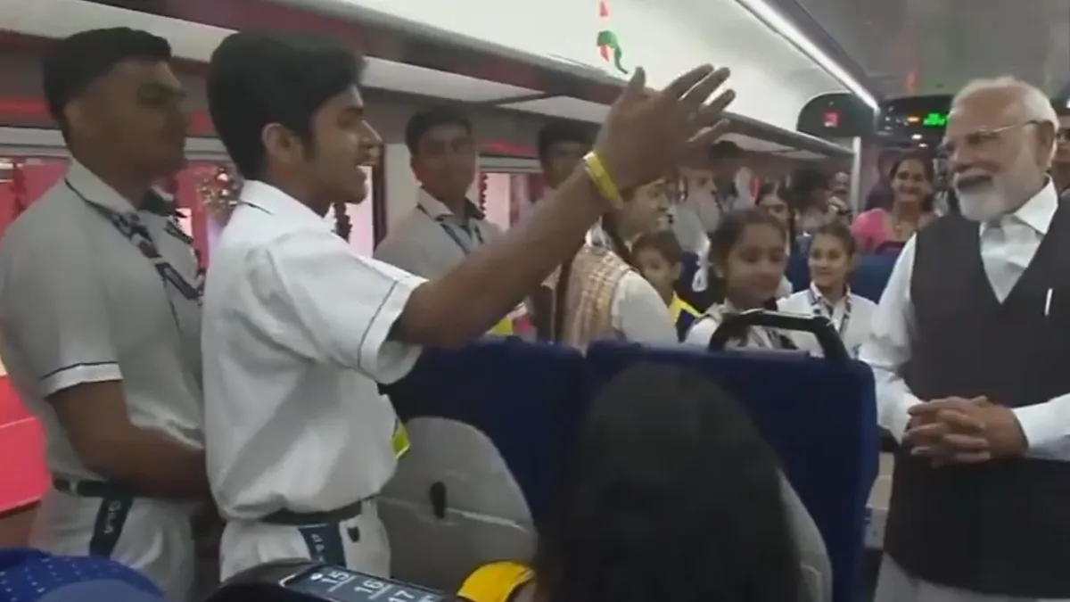 PM Modi interacts with school children onboard the Katra-Srinagar Vande ...