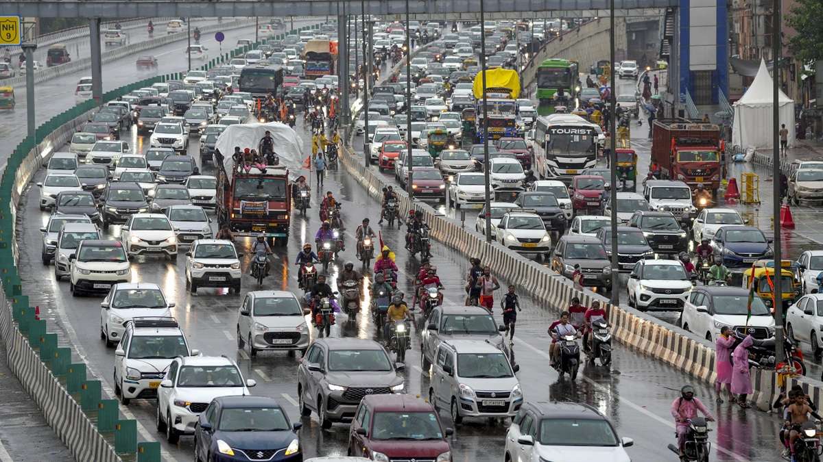 Delhi wakes up to heavy rain traffic chaos waterlogging as IMD forecasts wet spell across NCR ...
