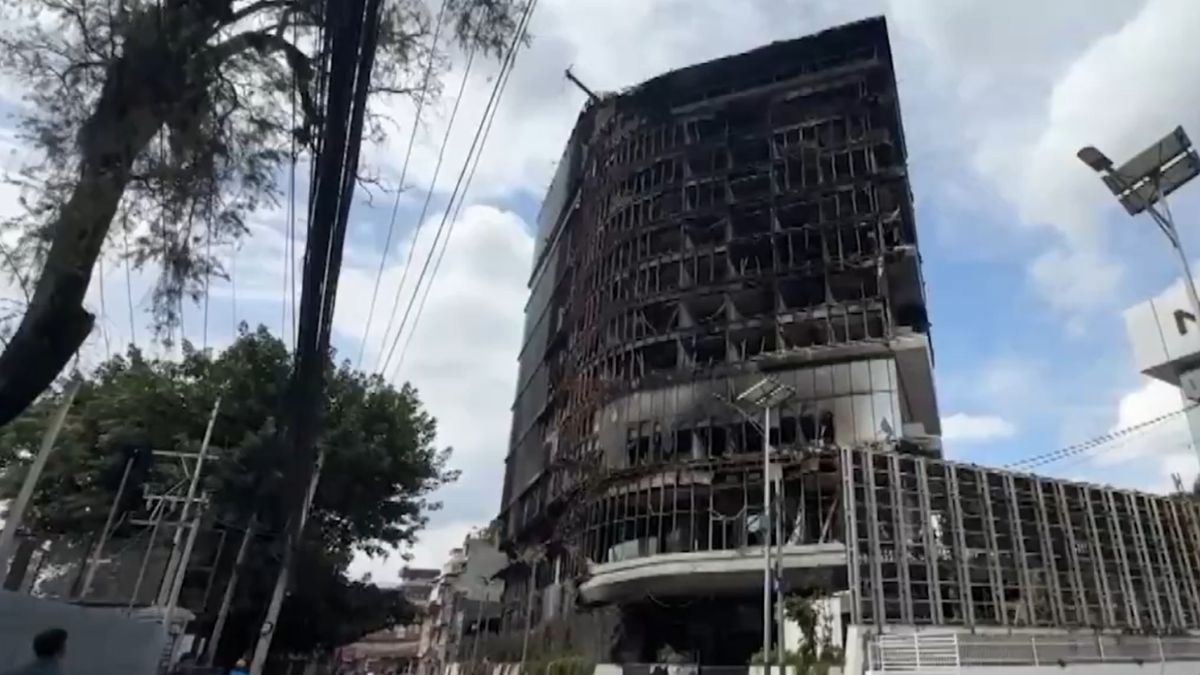 Charred remains of Hilton Hotel seen days after protesters torch ...