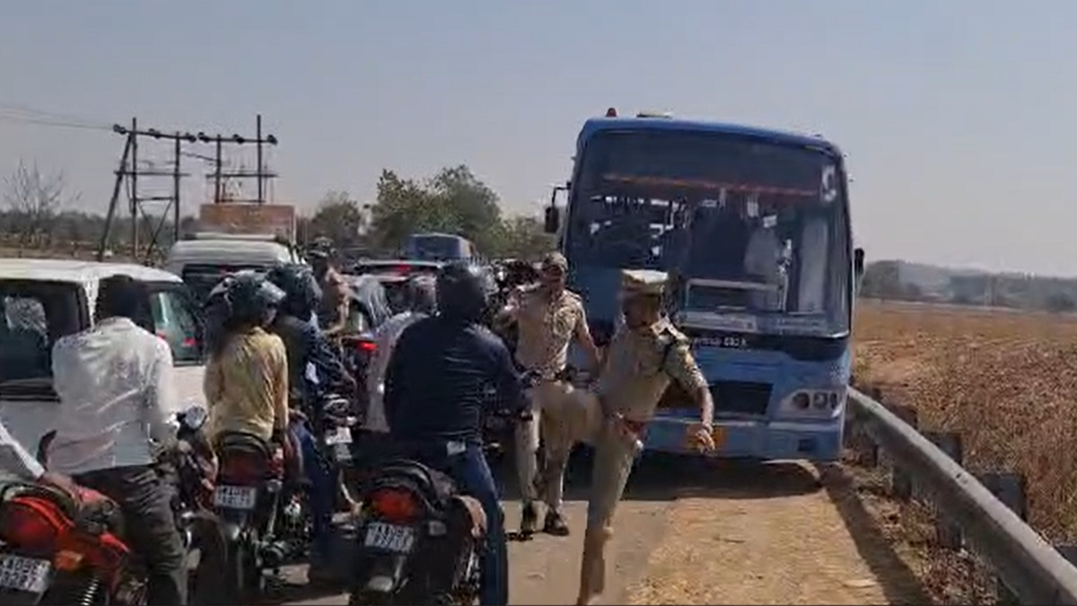 Video of police kicking a biker while managing traffic for CM ...
