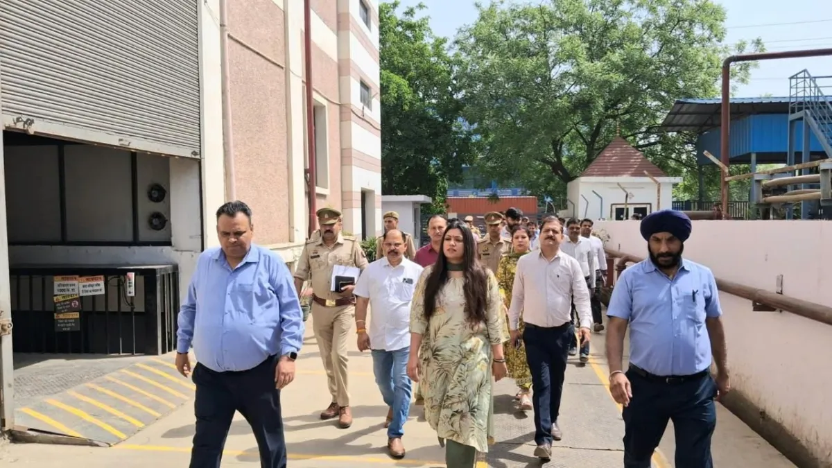 Noida DM Medha Roopam visits JBJ Technology Ltd; reviews production and ...