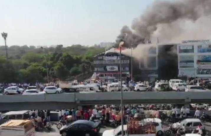 Fire engulfs Surat building: 18 students killed, several jump off ...