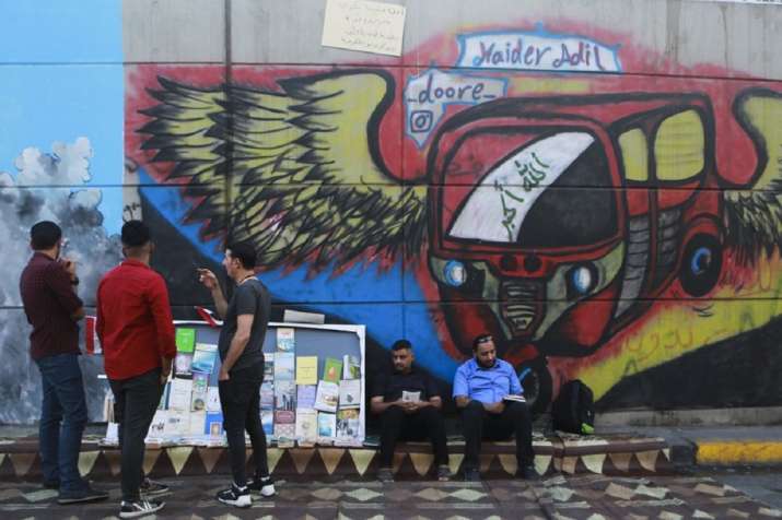 In Pictures: Graffiti at Baghdad tunnel amid massive protests in Iraq ...