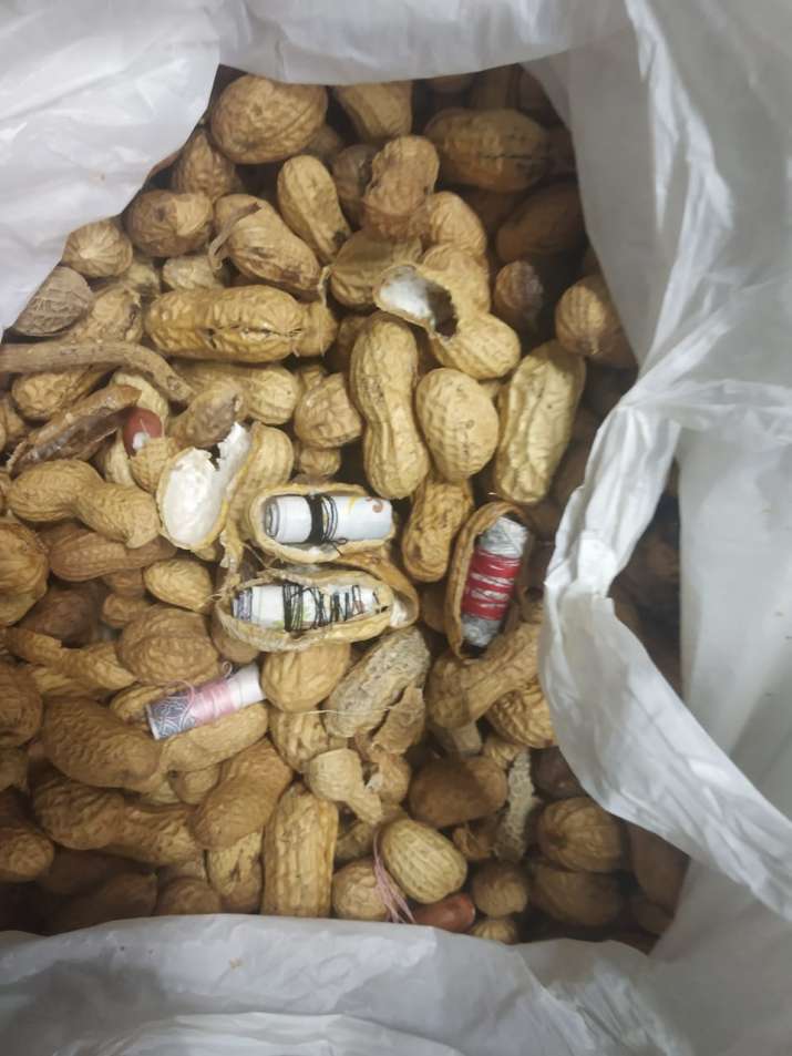 Flyer stuffs dollars, euros inside peanuts, meatballs to smuggle, gets ...