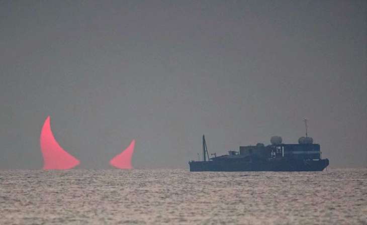 Sunrise in Qatar during solar eclipse shows 'Red Devil Horns' | Photos ...