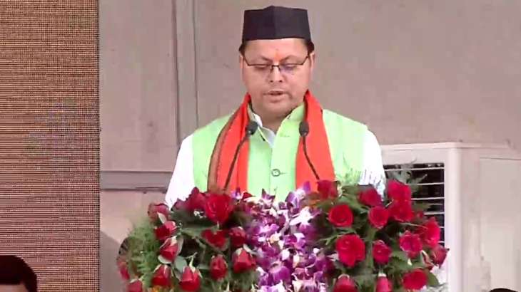 Pushkar Singh Dhami takes oath as Chief Minister of Uttarakhand for ...