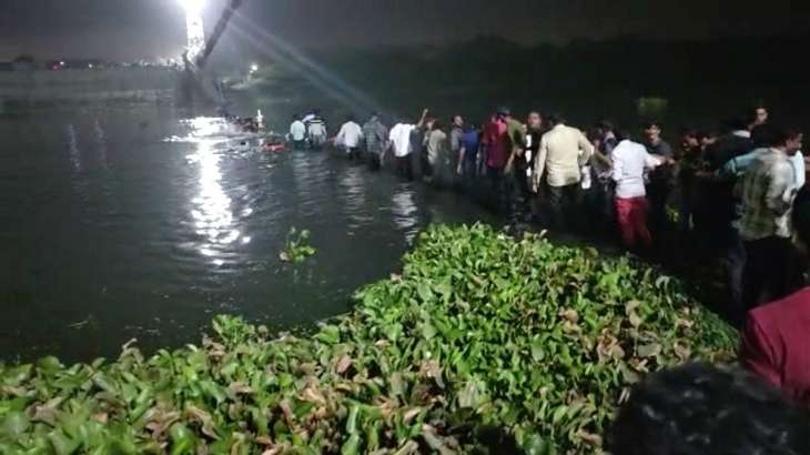 Gujarat: At least 77 dead as century-old cable bridge collapses 4 days after it was reopened ...