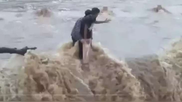 Rajasthan: Two men trapped on swollen bridge rescued with hydraulic ...