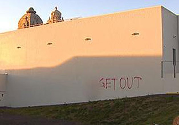 Hindu temple sign hit with over 60 shotgun blasts-IndiaTV News | World ...