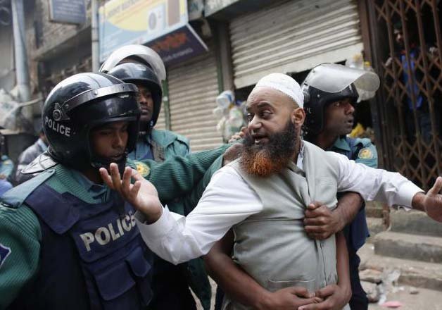 Three held in Bangladesh for pasting anti-Modi posters- IndiaTV news ...