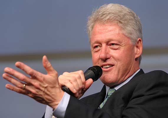 Bill Clinton visits school kitchen, serves food to students | India ...