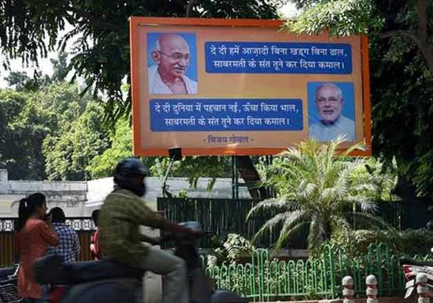 Now BJP leader in UP puts up hoardings likening Modi to Gandhi ...
