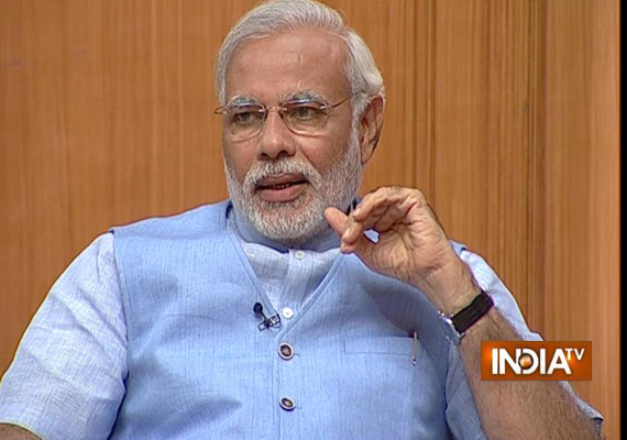 Modi clarifies on not wearing skull cap, puppy remark | National News ...