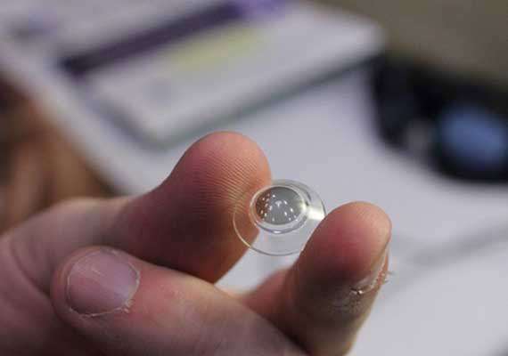 Contact lens-based Google Glass competitor unveiled at CES 2014, iOptik ...