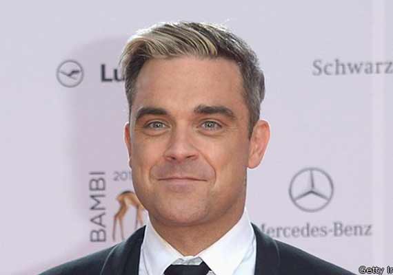Robbie Williams eyes musical biopic | Hollywood News – India TV