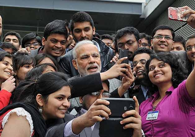 PM Narendra Modi clicks selfie with Indian students in France | World ...