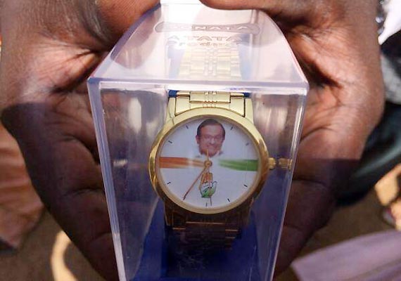 EC seeks report on Modi's charge on wrist watches with Chidambaram pic ...