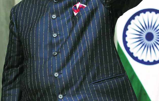 PM Modi's monogrammed suit raises nearly $700,000 at auction | India TV ...
